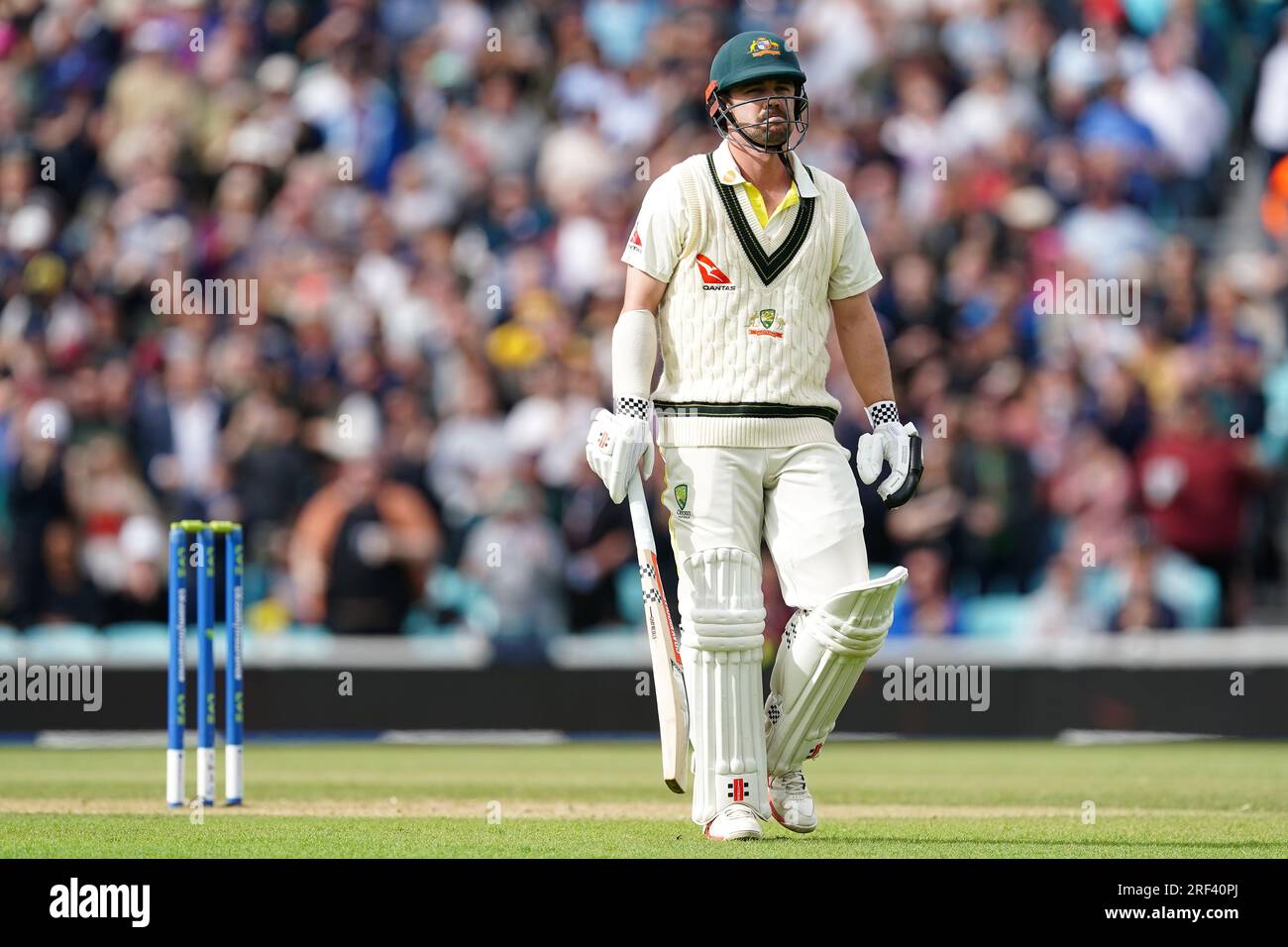Australia's Travis Head looks on after being caught out by England's ...
