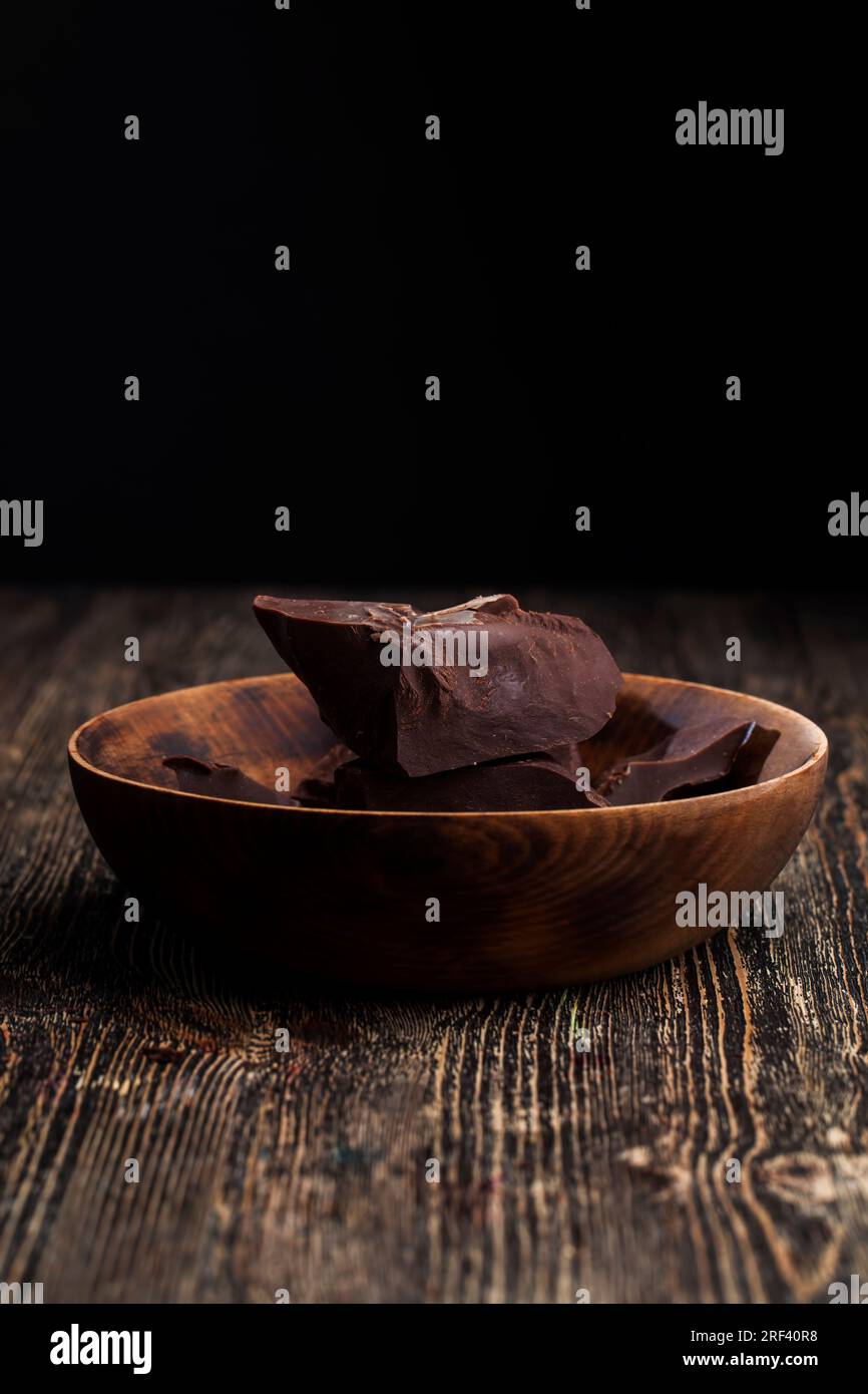 large chunks of chocolate with cocoa and cocoa butter, divided into ...