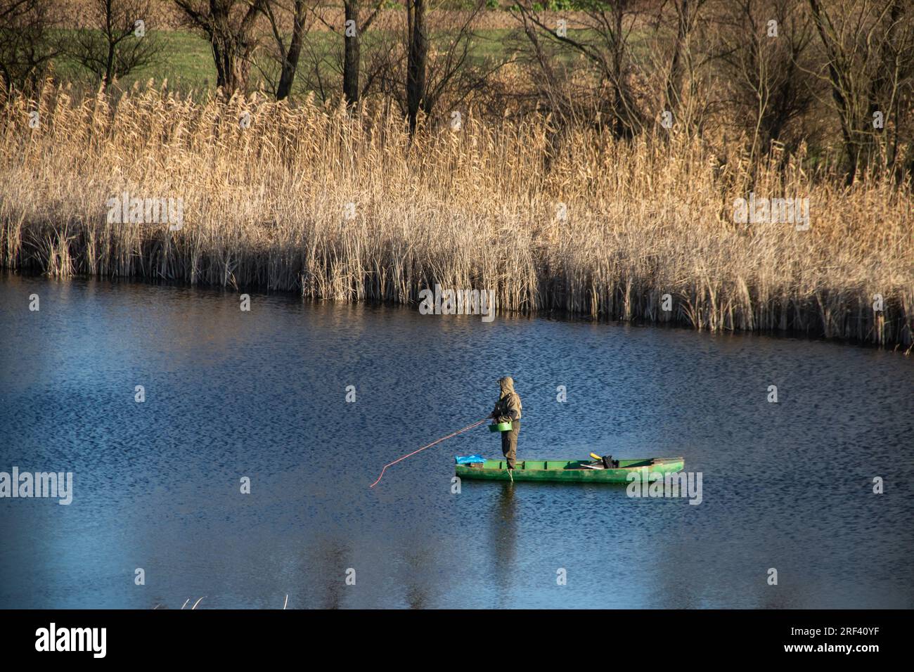 Rowing boat calm water hi-res stock photography and images - Alamy