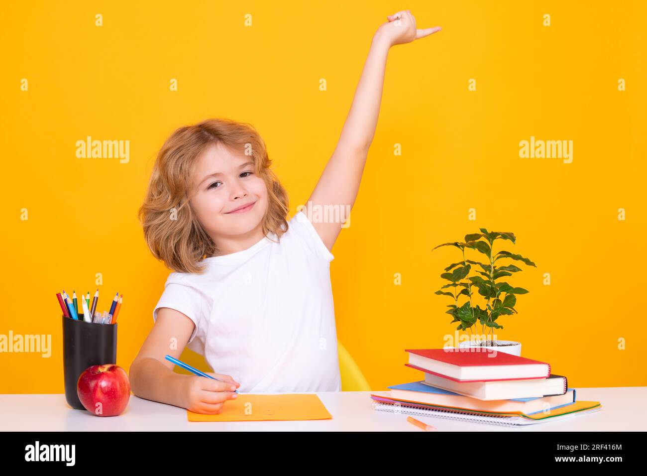 School and kids. Cute blonde child with a book learning. Knowledge day ...