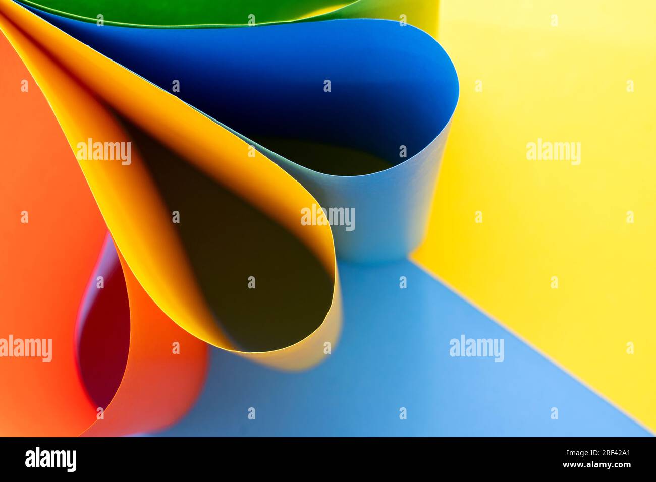 Abstract rolls colorful background with colored paper. Multicolored ...