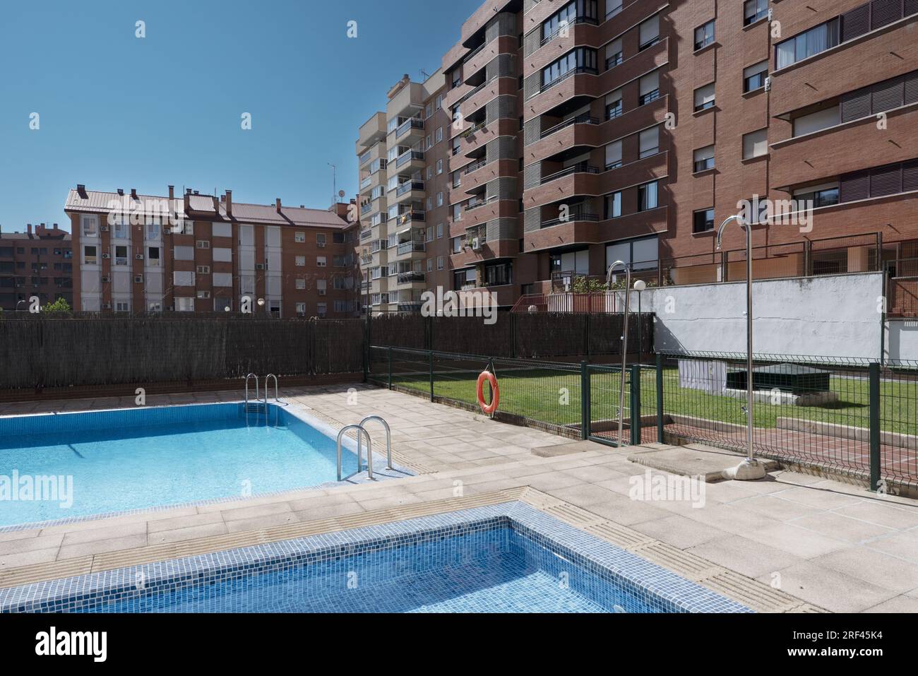 Summer pools in an urban development prepared for a refreshing dip and ...