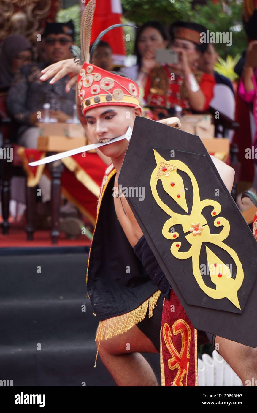 Ruai dance from West Kalimantan at BEN Carnival. This dance tells about ...