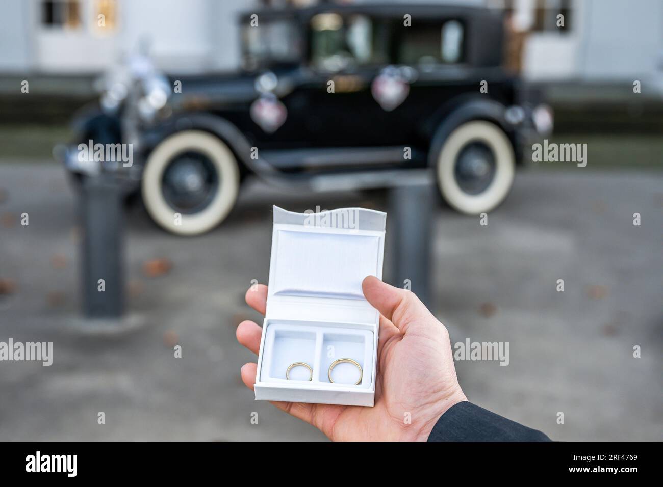 Groom hold in hand Romantic marriage couple wedding Symbols rings in a ...