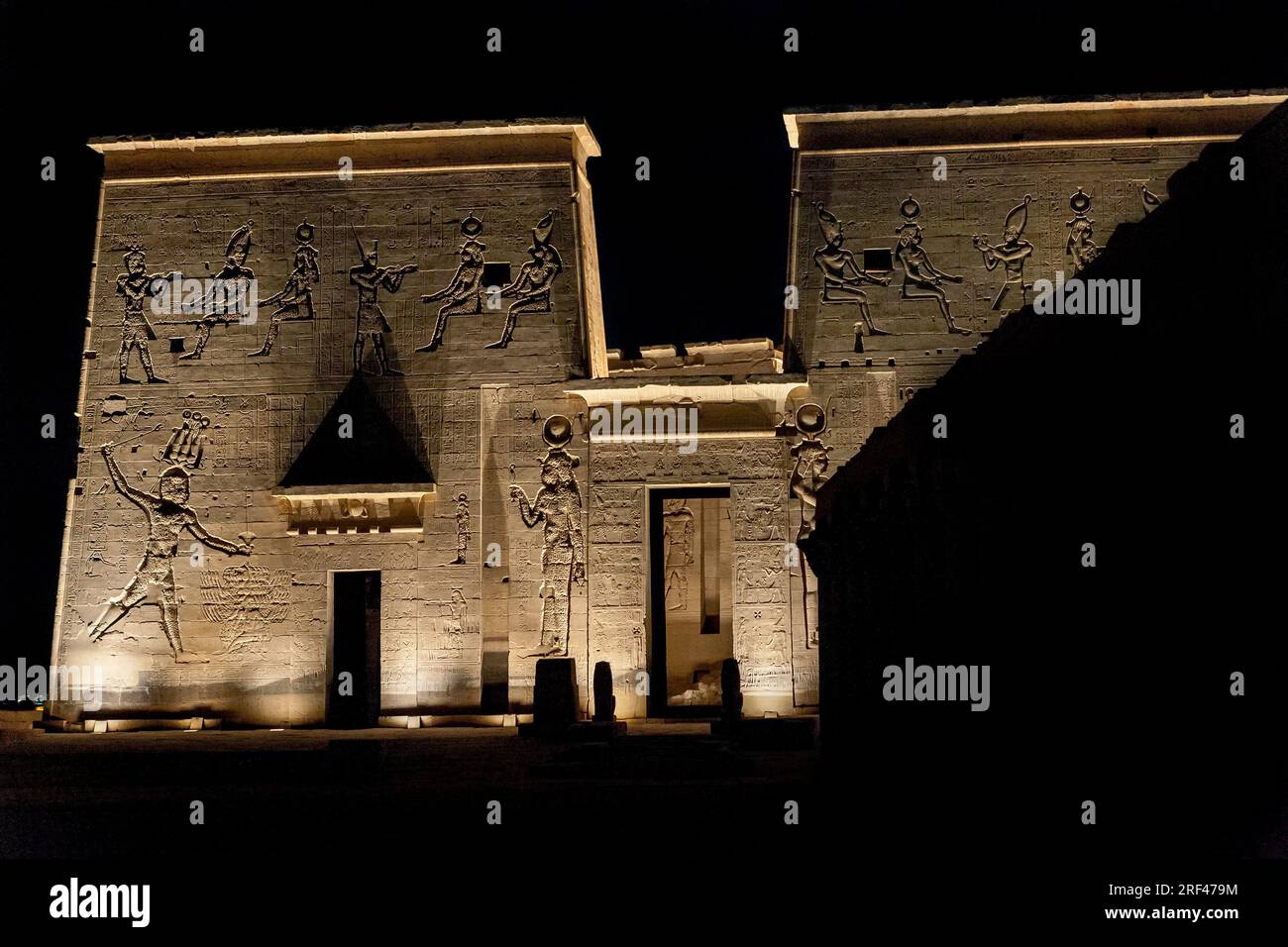The Temple of Isis at Philae, first pylon, illuminated at night Stock ...