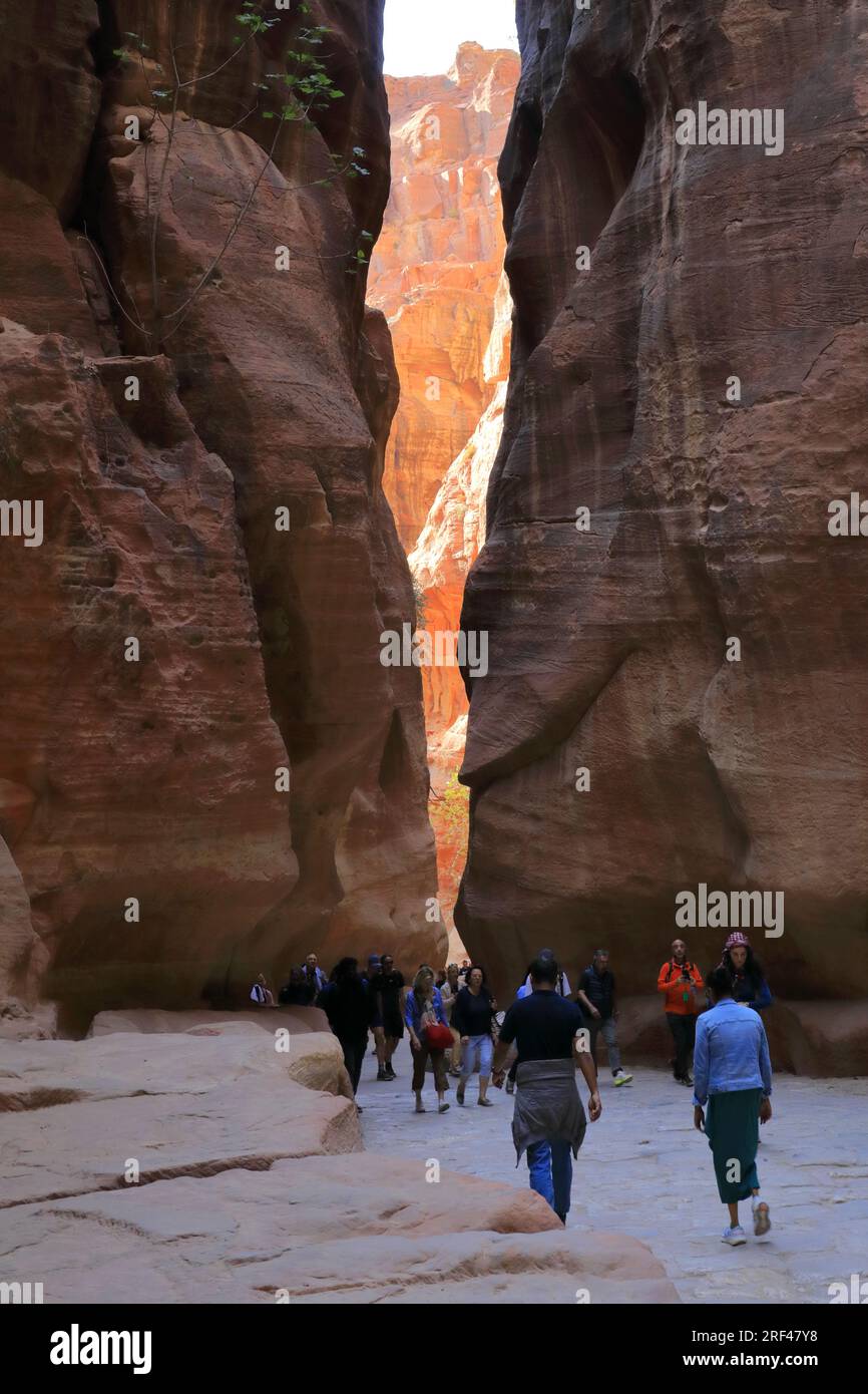 People walking along the Al-Siq, the Main Entrance Canyon to Petra ...