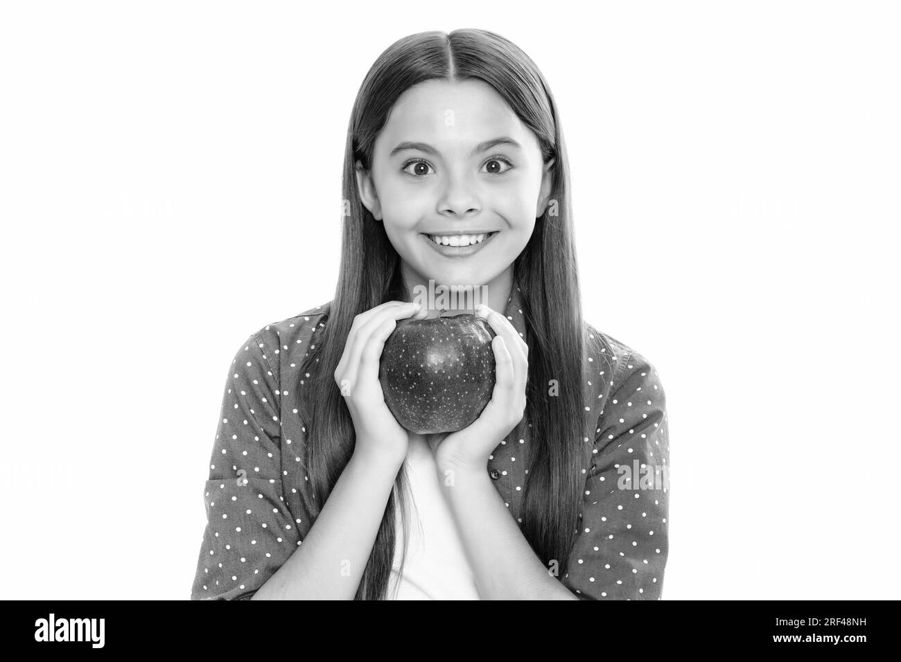 Teenager child with apple on yellow isolated background. apples are ...