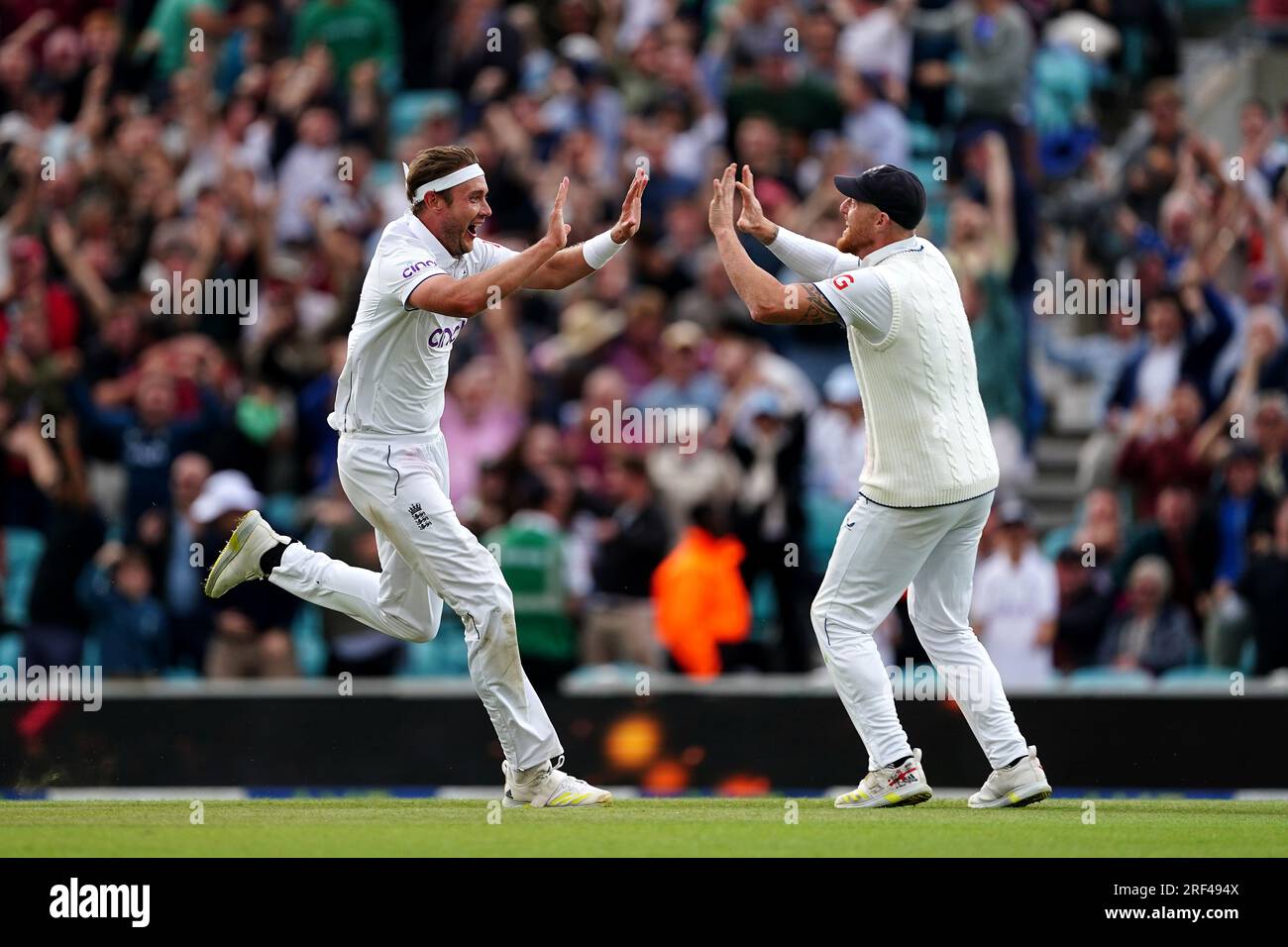 England's Stuart Broad celebrates taking the wicket of Australia's Todd ...