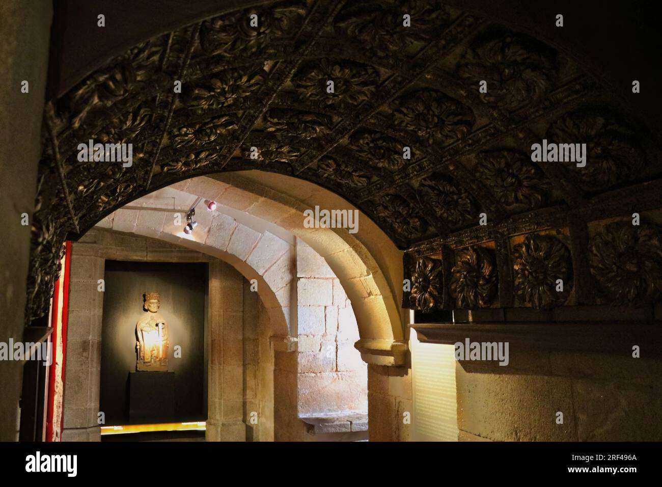 Carved decorative wooden arch inside the Santiago Cathedral Museum with ...