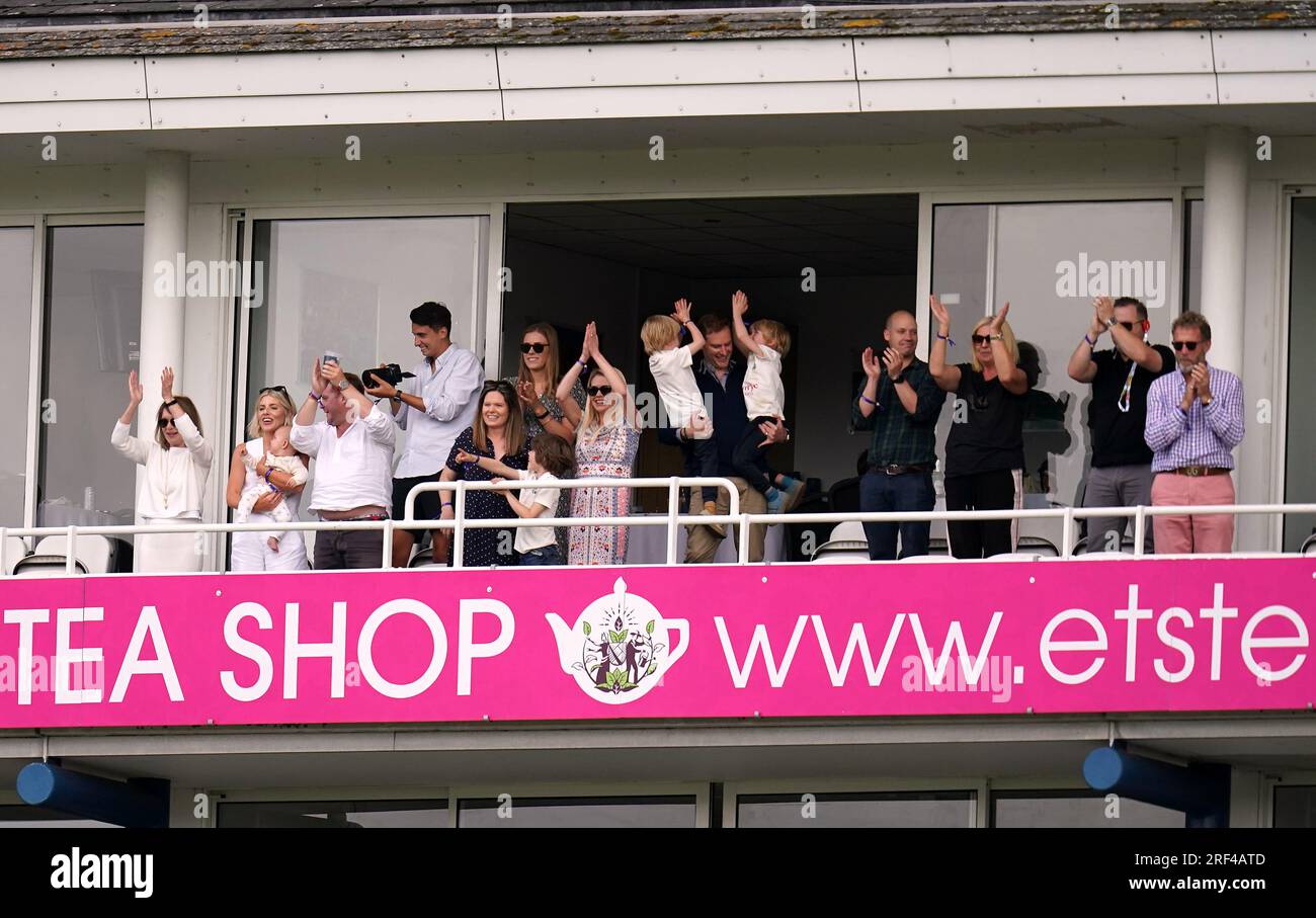 The friends and family of England's Stuart Broad celebrate on a balcony ...