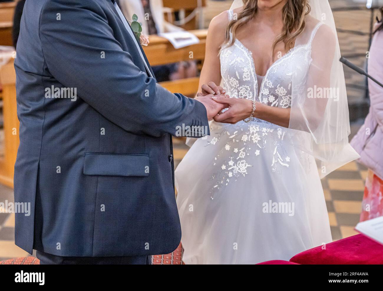 wedding rings and hands of bride and groom ring exchange couple at ...