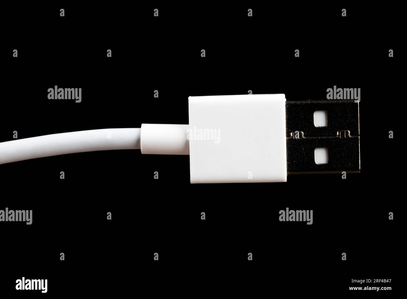 white electric wires and charger for mobile phone and other electrical ...