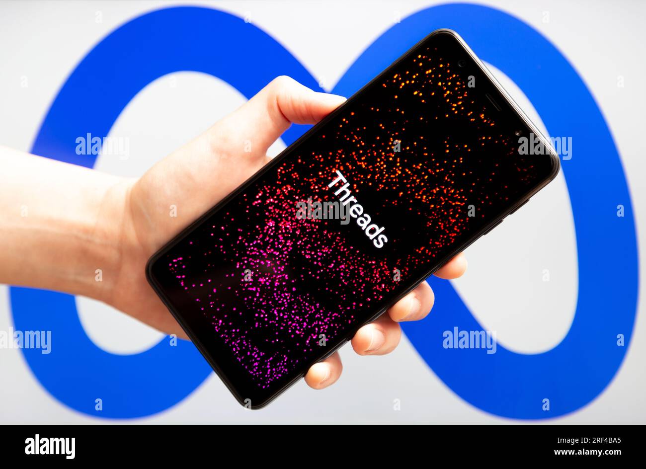 Ukraine, Odesa - July, 7 2023: Hand holding mobile with Threads app ...