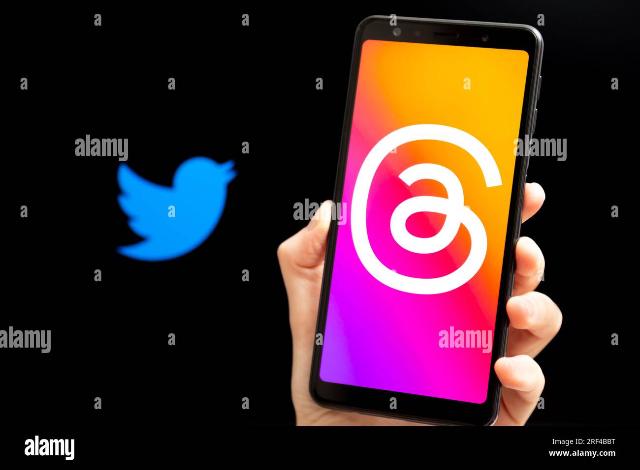Ukraine, Odesa - July, 7 2023: Hand holding mobile with Threads app ...