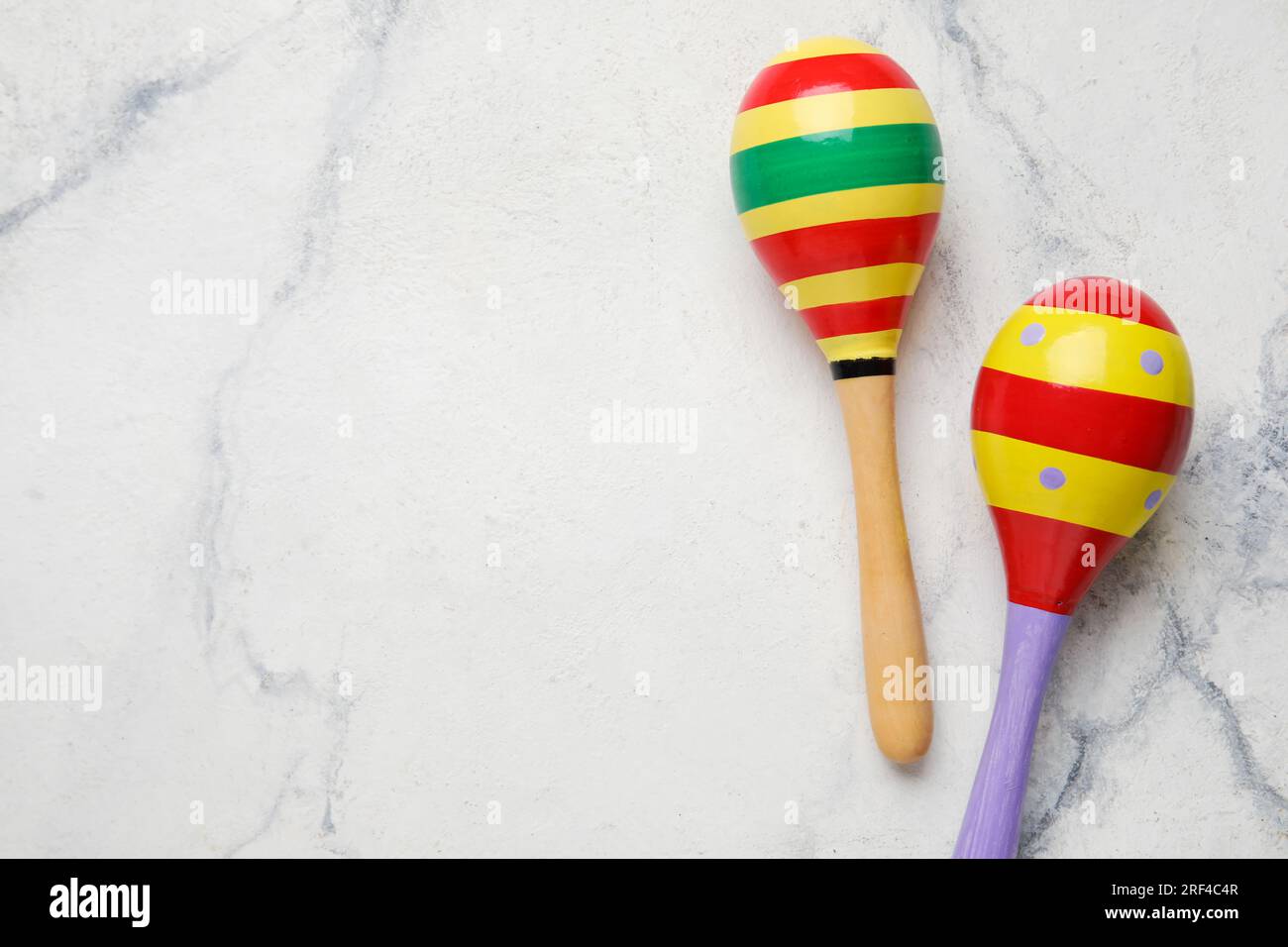 Mexican maracas on grunge background Stock Photo - Alamy