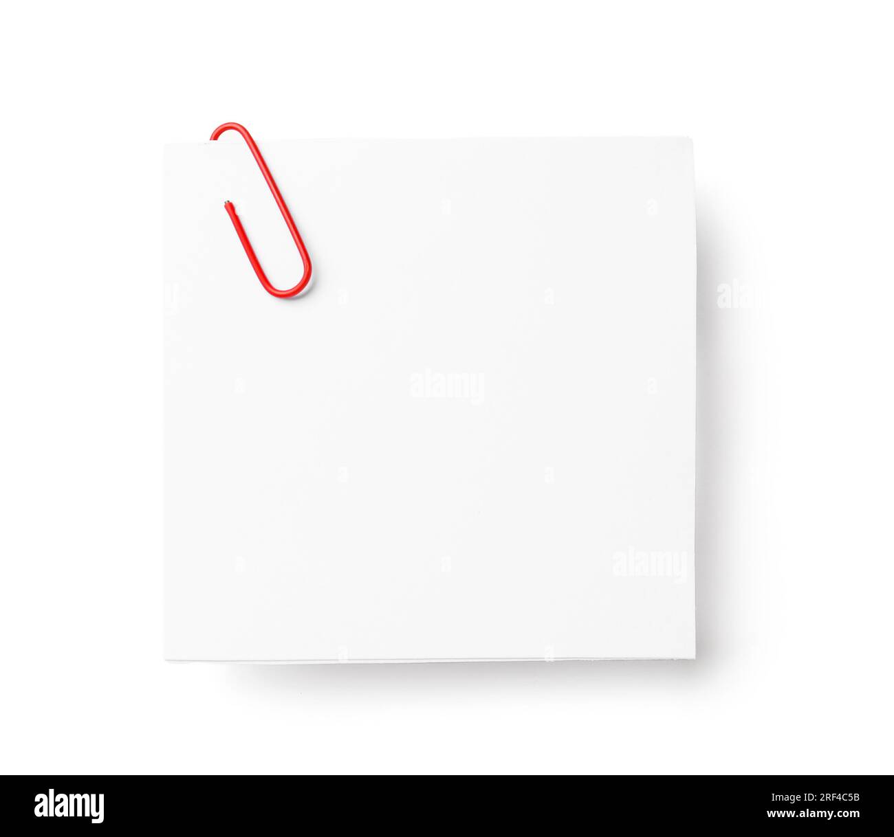 Sticky note with paper clip on white background Stock Photo - Alamy
