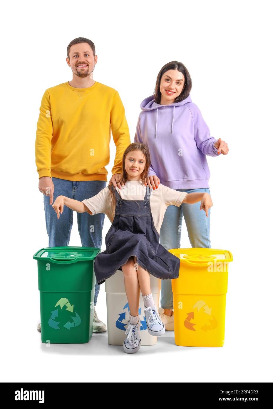 Family pointing at recycle bins on white background Stock Photo - Alamy