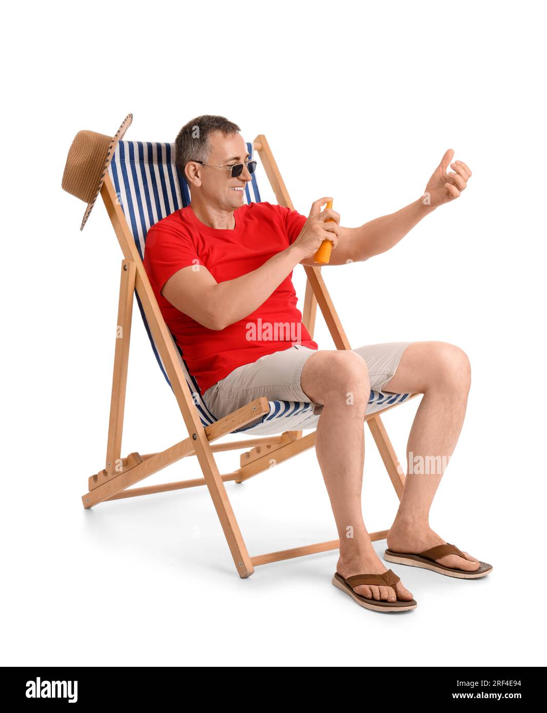 Applying sunscreen Cut Out Stock Images & Pictures - Alamy