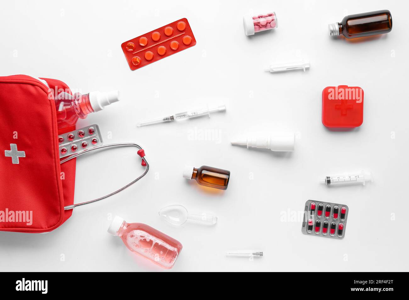 Composition with first aid kit, stethoscope, pills and medical supplies ...