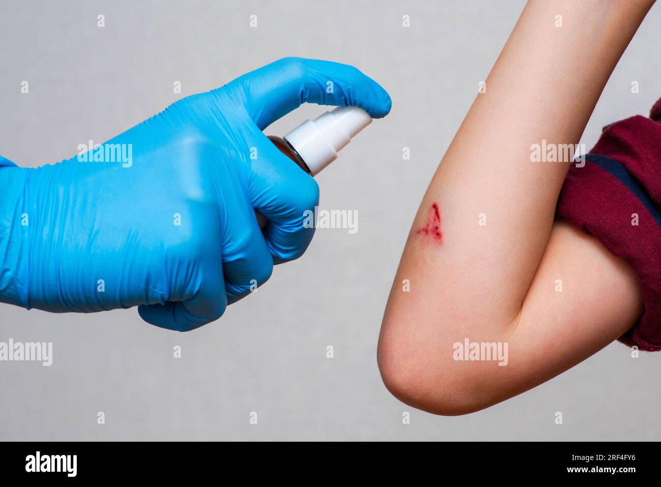 Woman child spray skin hi-res stock photography and images - Alamy