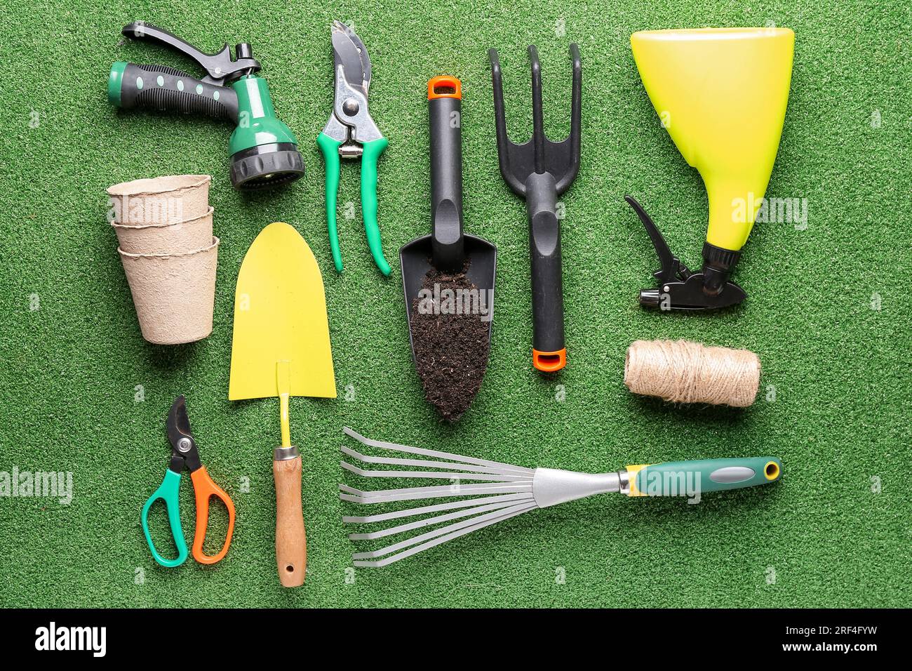 Composition with different gardening tools on color background Stock ...