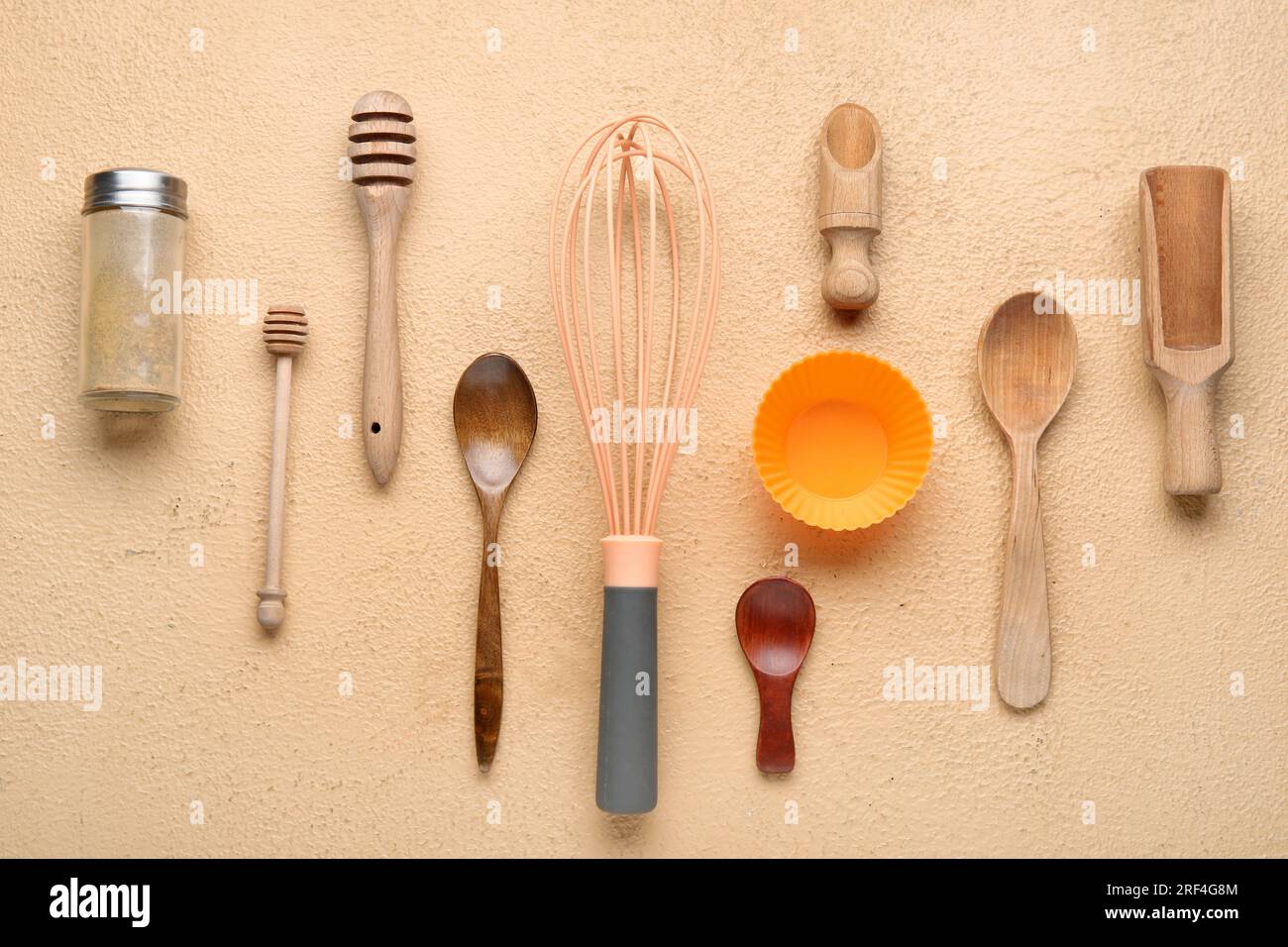 Composition with different kitchen utensils on color background Stock ...