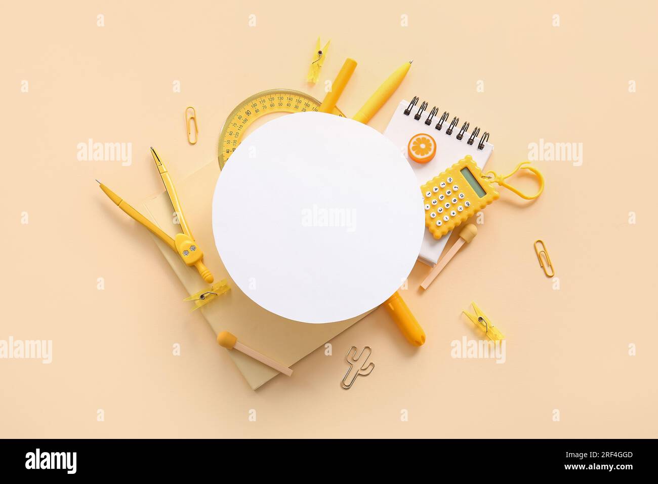 Composition with blank paper sheet and different school stationery on ...