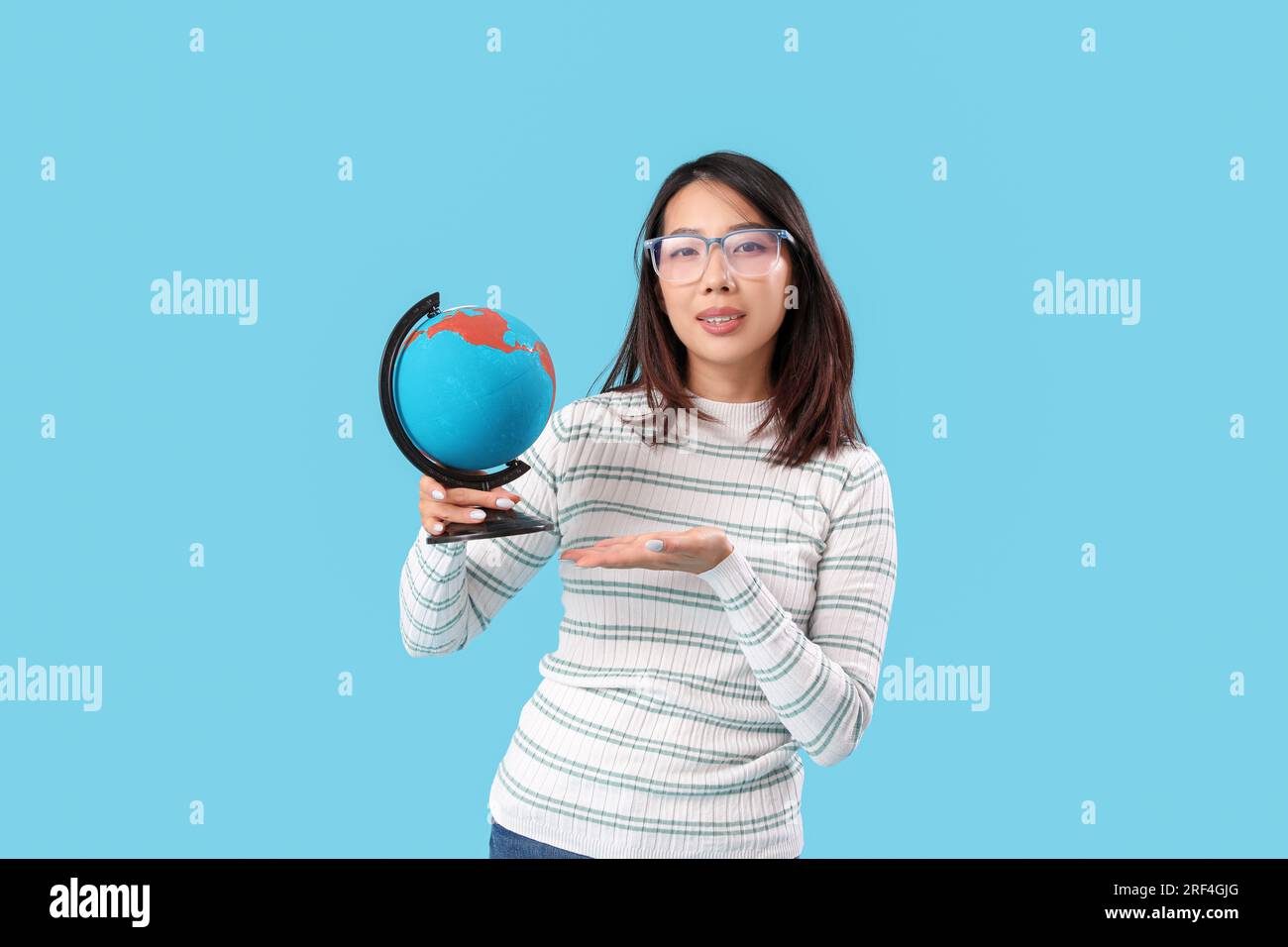 Female asian geography teacher hi-res stock photography and images - Alamy