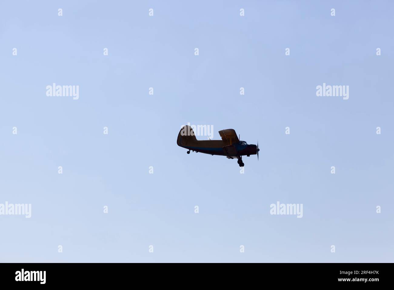 flying in the sky is an ordinary plane with four wings and a propeller ...