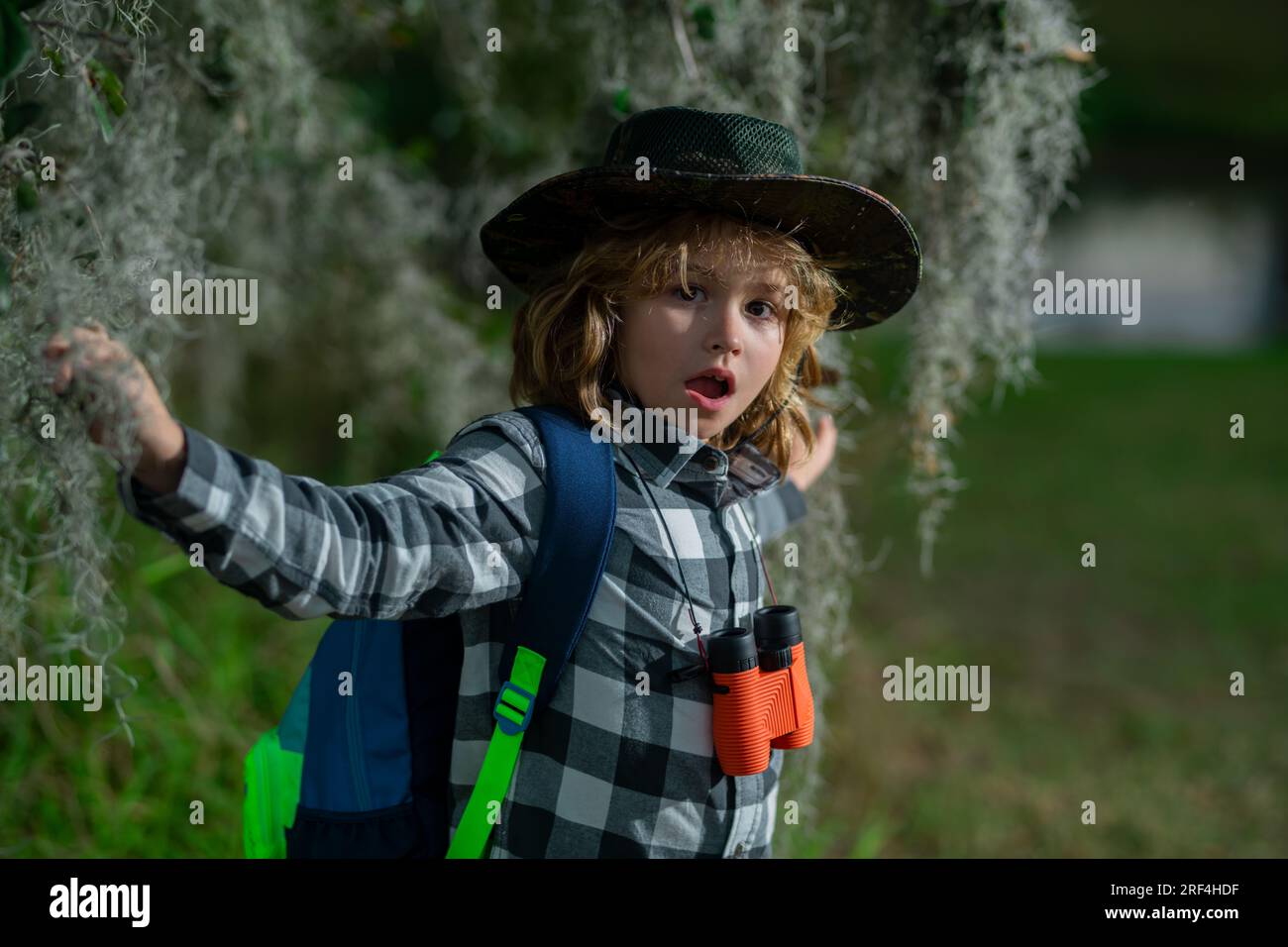 Travel and adventure concept. Little child boy tourist explorer with ...