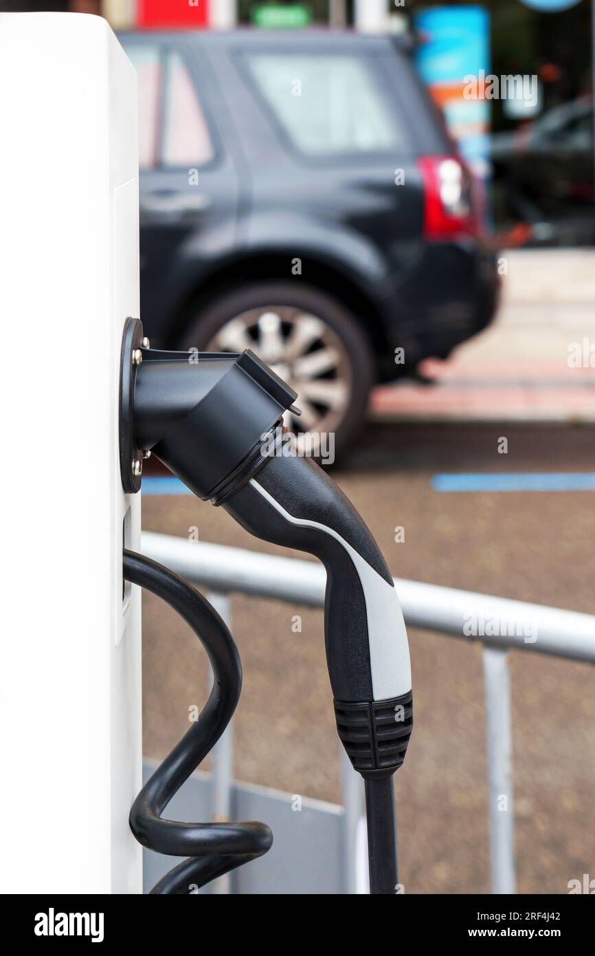 Electric car charging station with plug closeup. Power supply point for ...