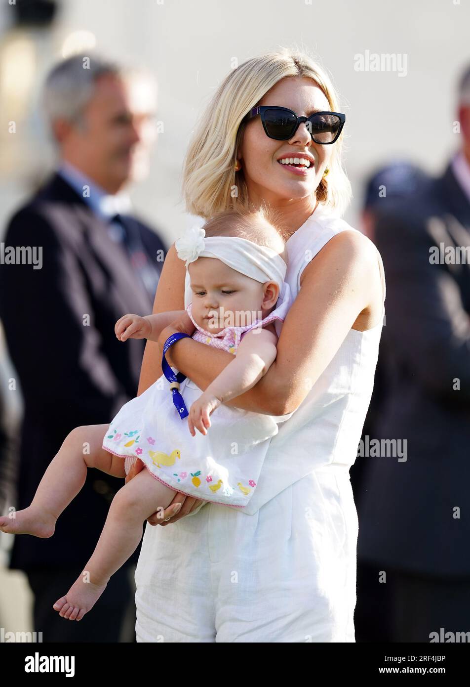 Mollie King, the partner of England's Stuart Broad, with their daughter ...
