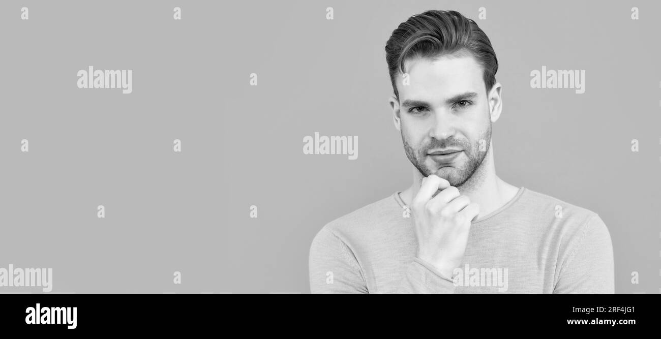 Handsome dude. Handsome man portrait grey background. Man face portrait, banner with copy space ...