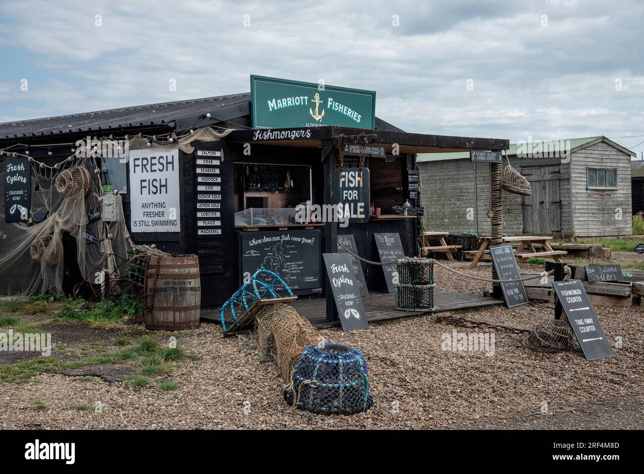 Traditonal fishermans shed now selling fresh fish on the beach at the ...