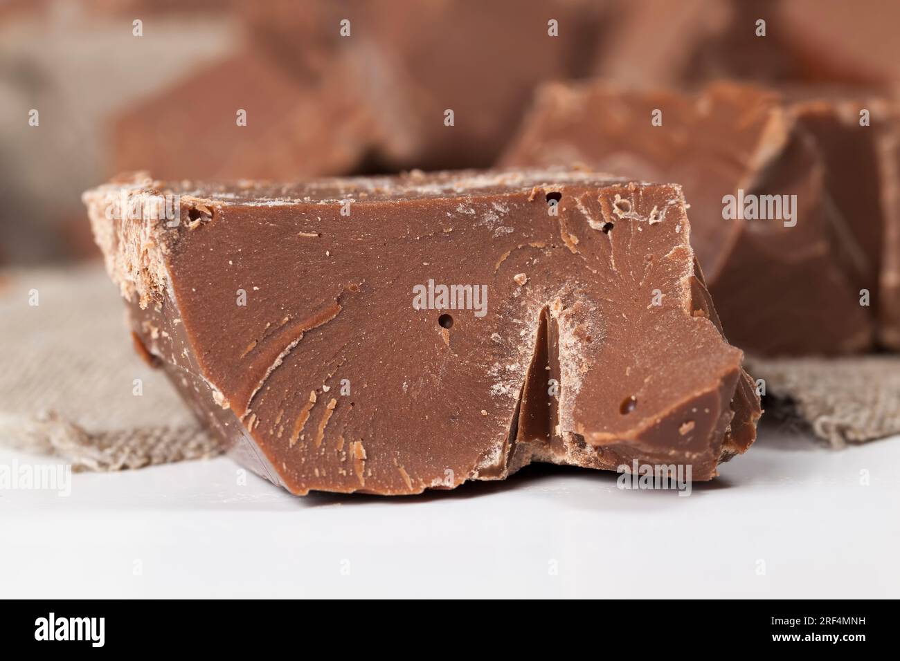 pieces of large natural real chocolate, broken into several parts ...