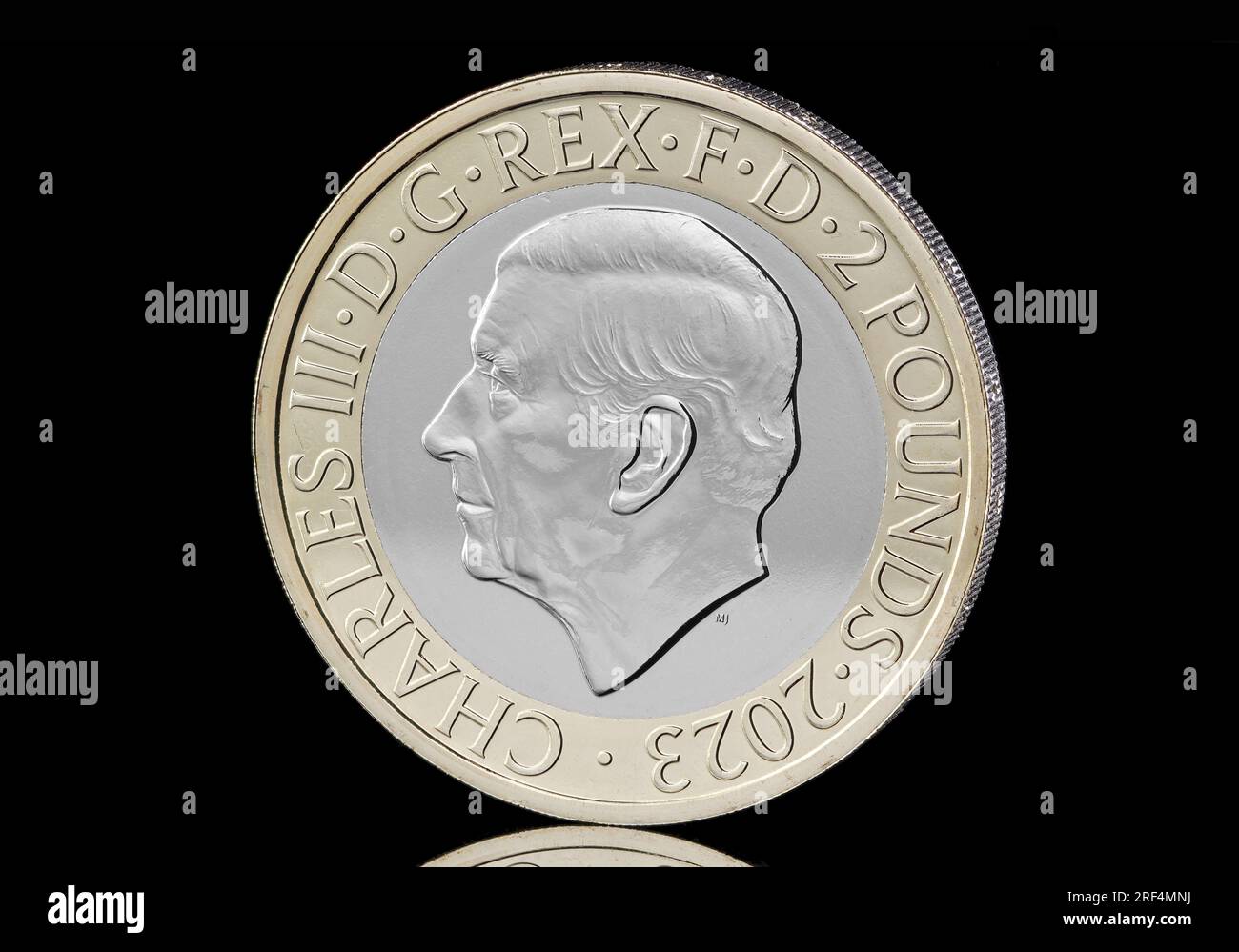 2023 bimetallic coin featuing the first coin portrait of King Charles ...