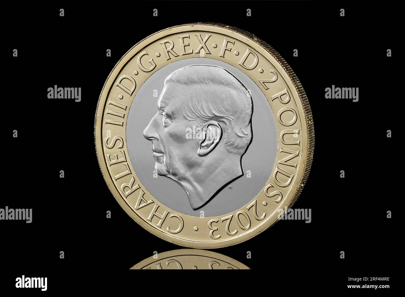2023 bimetallic coin featuing the first coin portrait of King Charles ...
