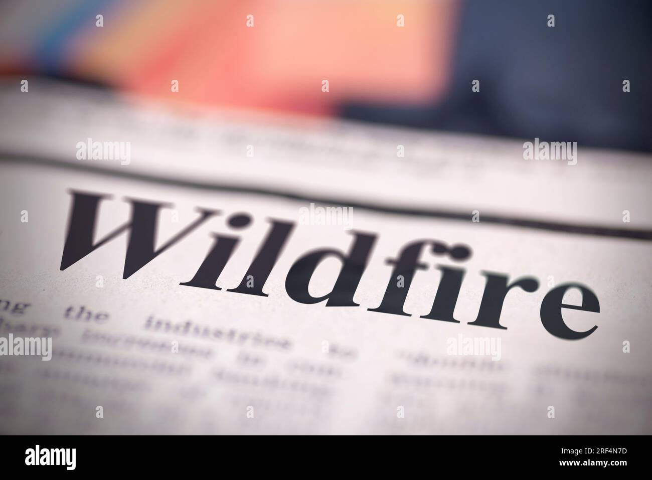 A close-up photograph highlighting a newspaper article discussing a ...