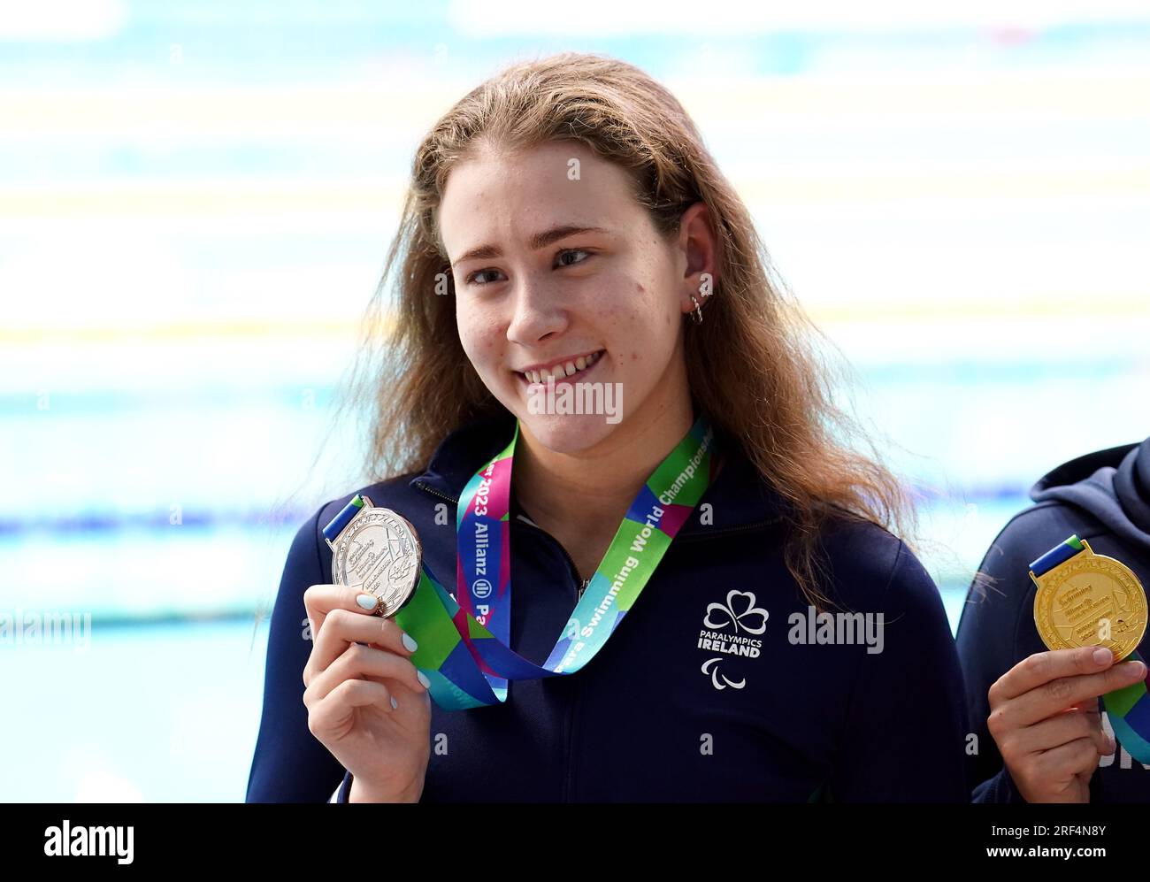 Ireland’s Roisin Ni Riain with their silver medal for the Women's 100m ...