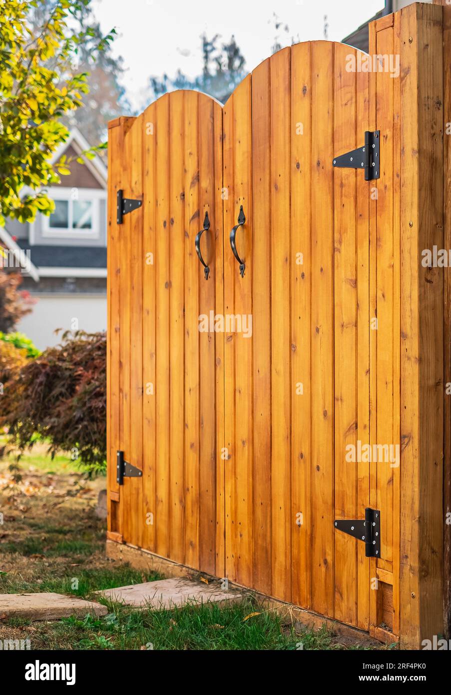 Entrance of house with beautiful new wooden gates. Gateway Background ...