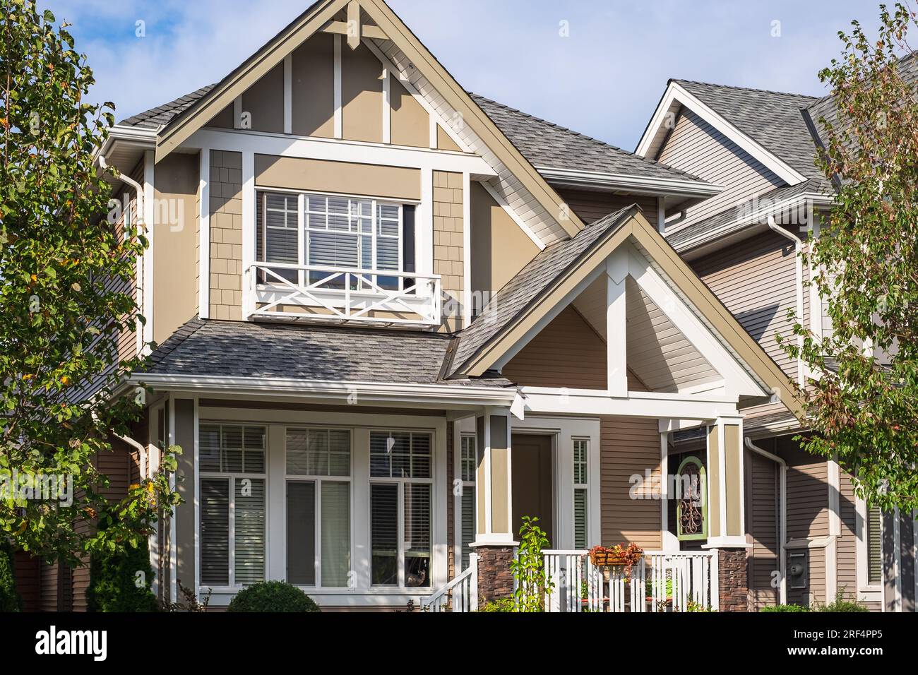 Real Estate Exterior Front House on a sunny day. Big modern custom made ...