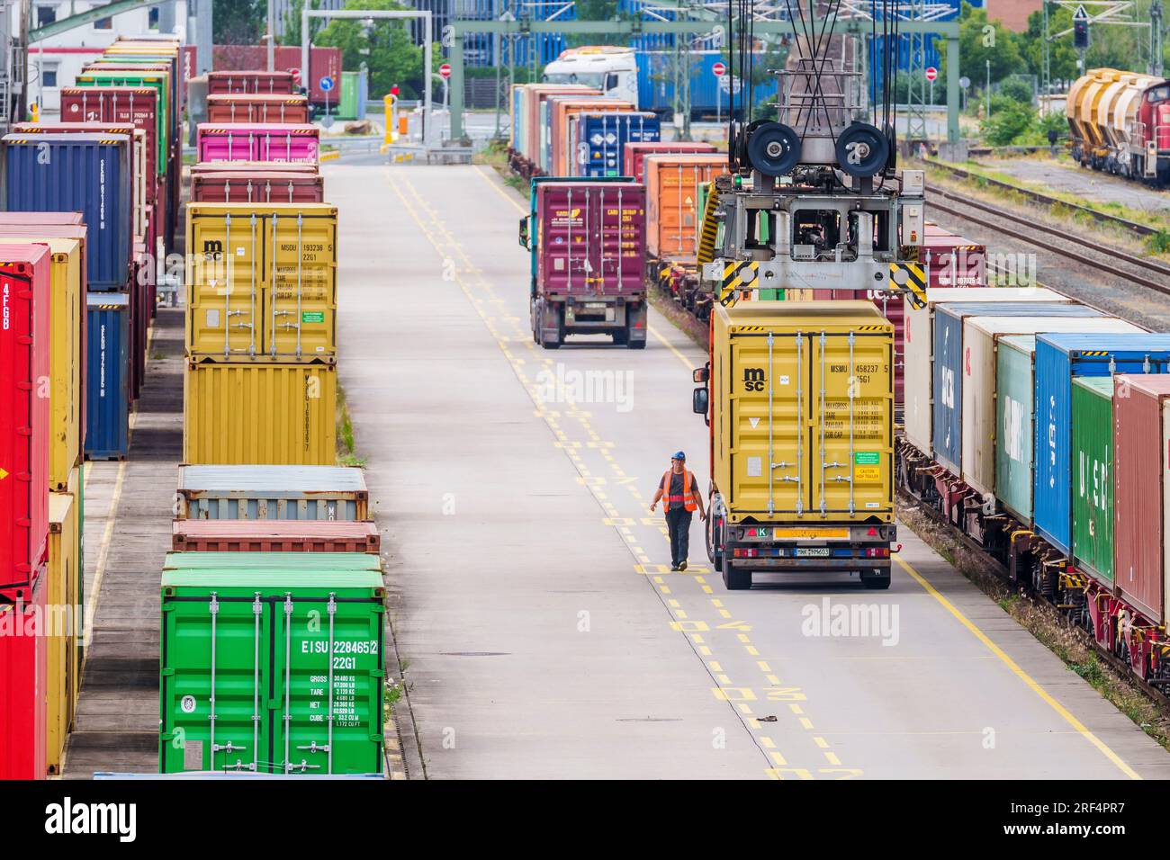 Freight container is loaded onto truck hi-res stock photography and ...