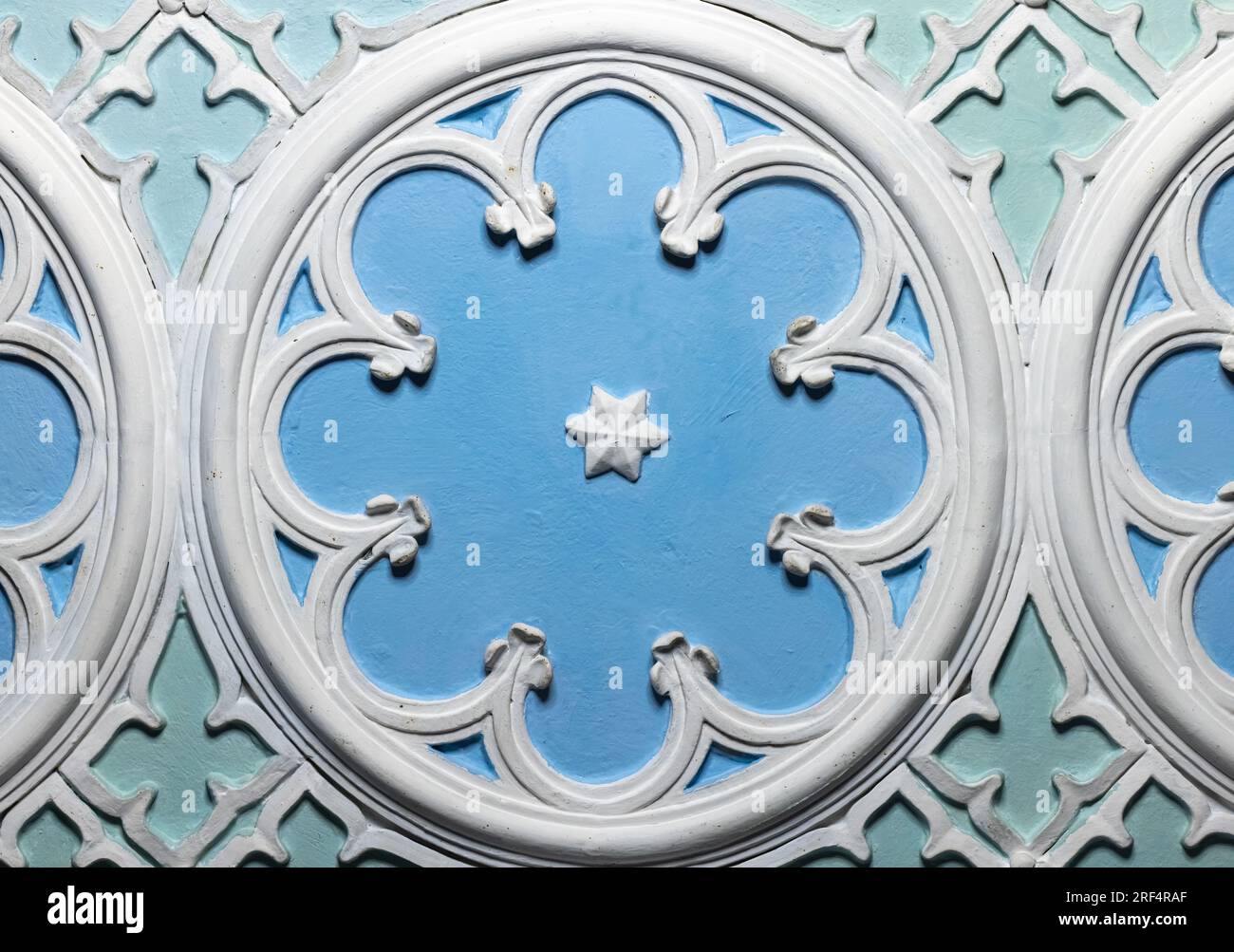 Ceiling design details in Gothic style. White gypsum bas-relief pattern ...