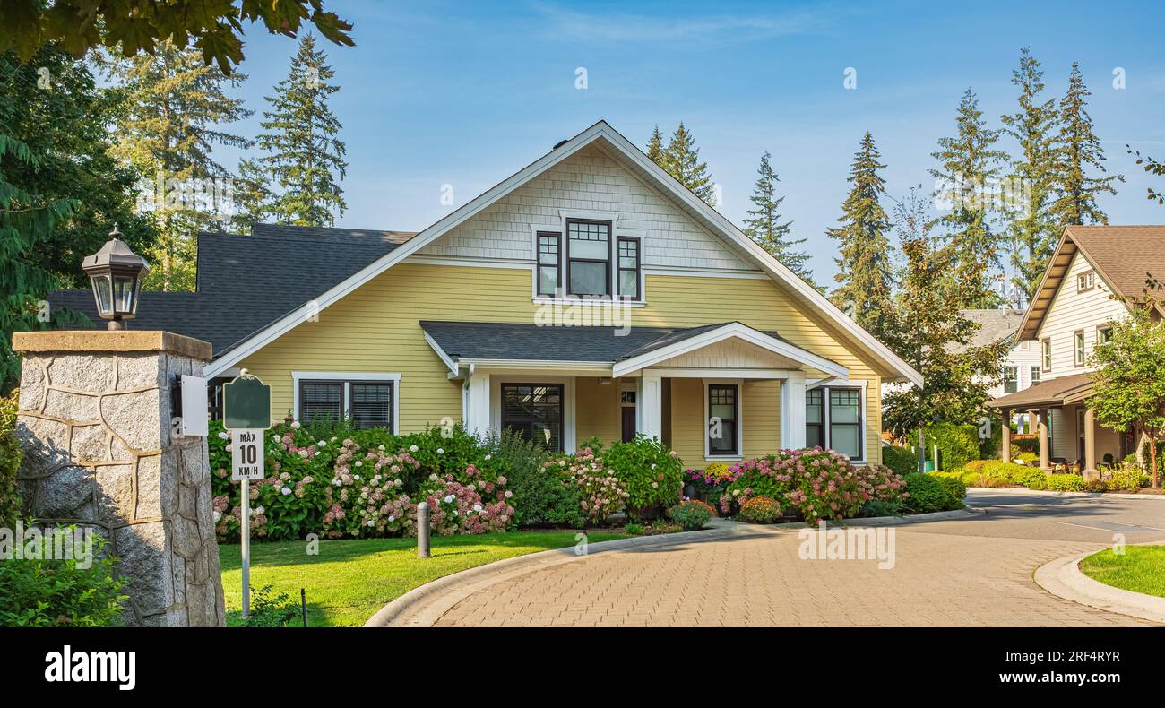 Real Estate Exterior Front House on a sunny day. Big modern custom made ...