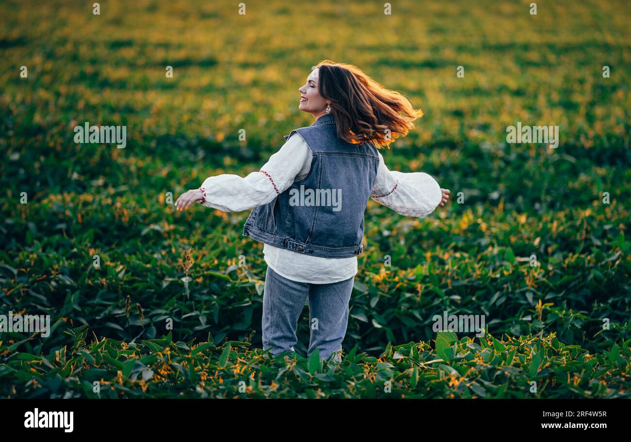Woman with open up arms, dancing. Hands up. Free girl, amazing summer ...