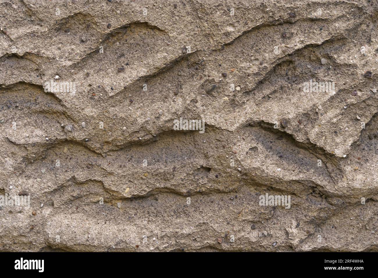 Texture of a concrete wall with indentations Stock Photo - Alamy