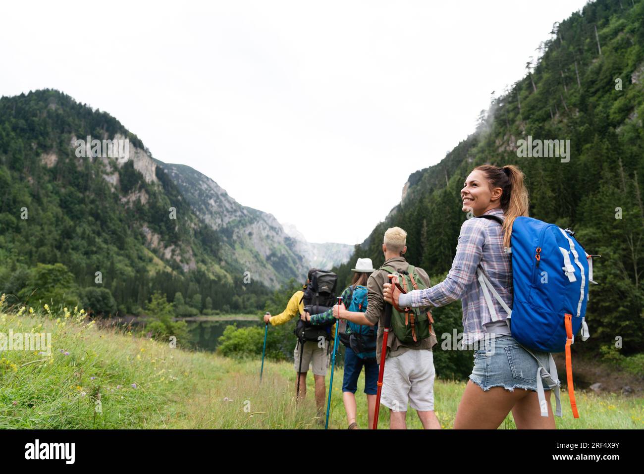 Group of happy friends enjoying outdoor activity together Stock Photo ...