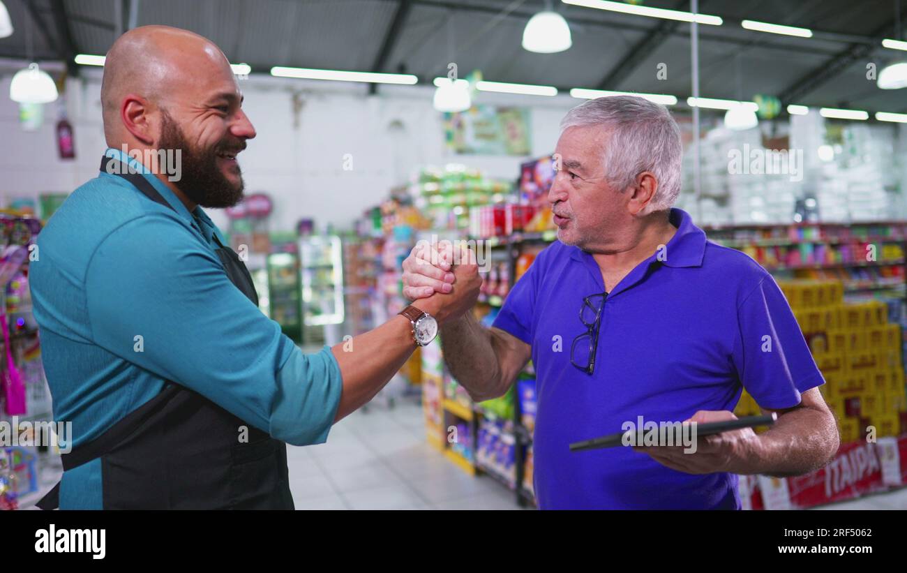 Grocery Store Boss Congratulating Employee for Good Job. High-Five ...