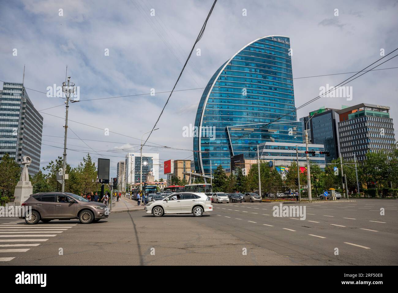 Street scene with traffic and the Blue Sky Hotel and Tower in the center of Ulaanbaatar, the ...