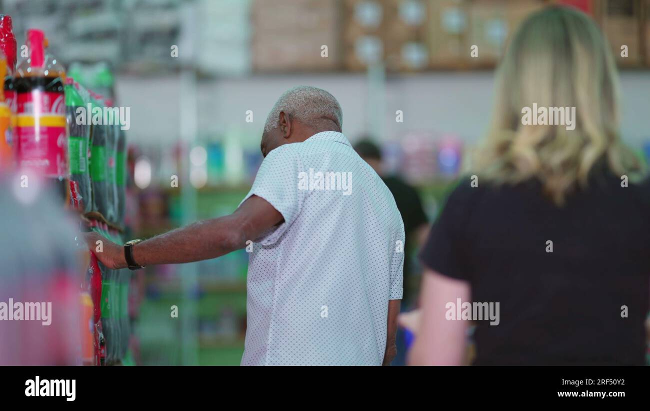 Consumer Behavior Depicted by Diverse Shoppers in Supermarket Aisle ...